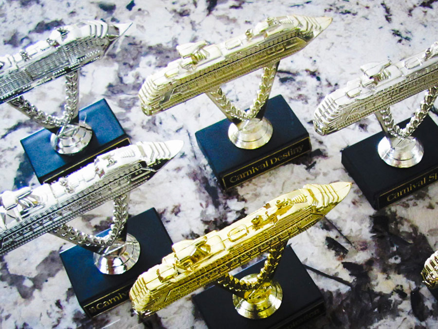 All About Carnival's 24-Karat Gold Plastic Ship On A Stick