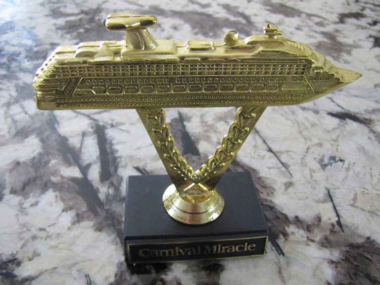 All About Carnival's 24-Karat Gold Plastic Ship On A Stick